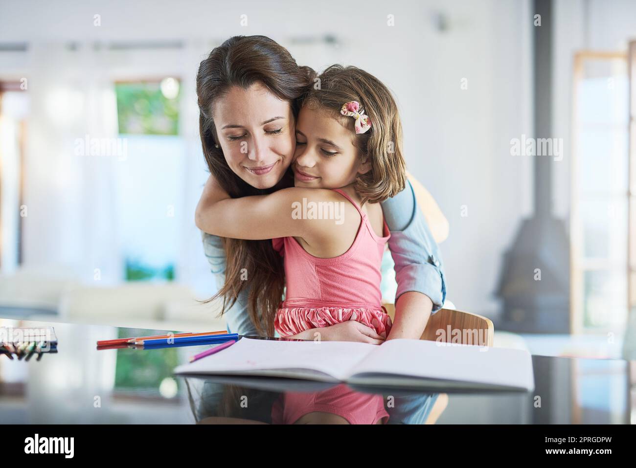 Mother hugging her hi-res stock photography and images - Alamy