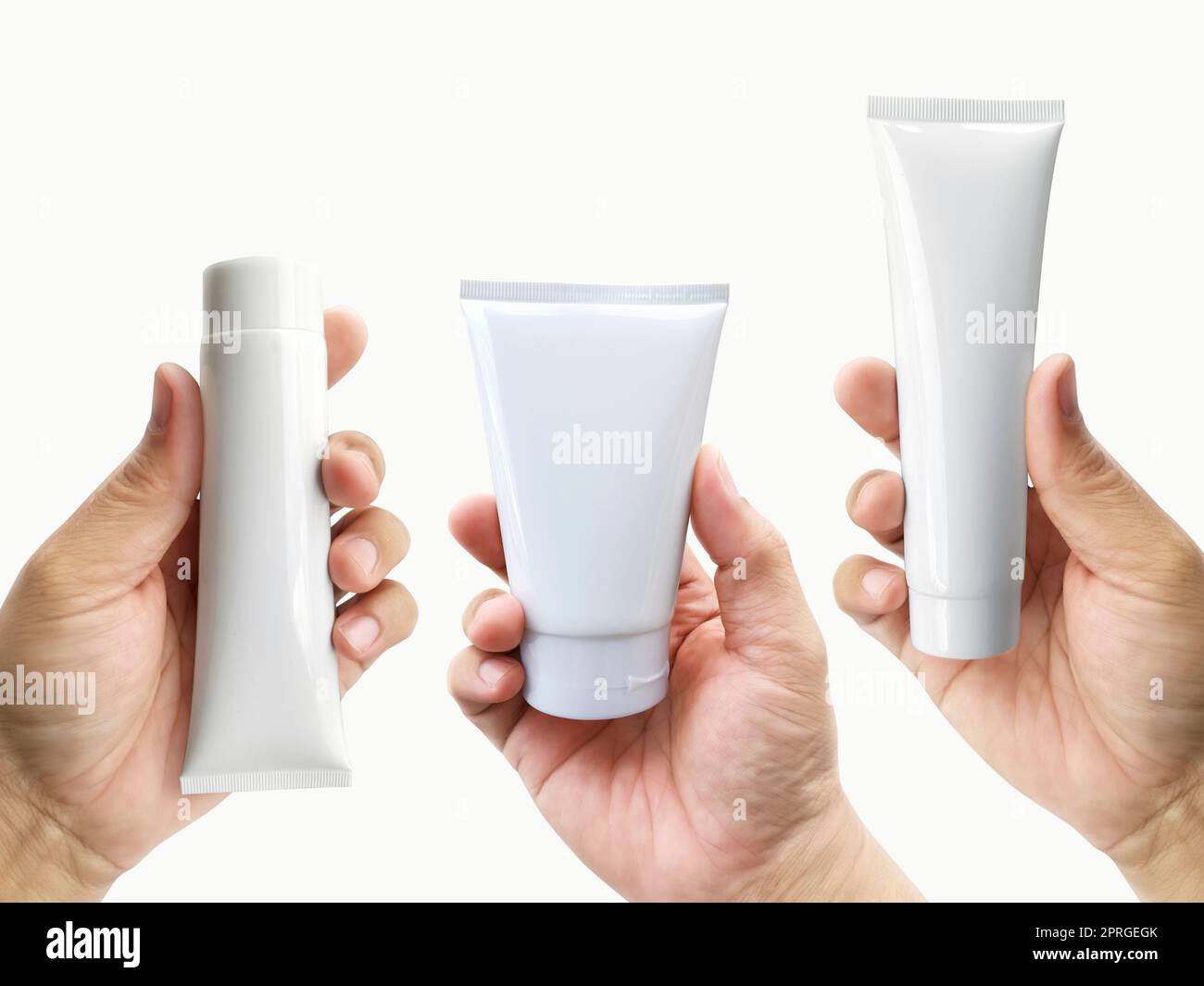 Hand holding Cosmetic plastic tube isolated on white background Stock ...