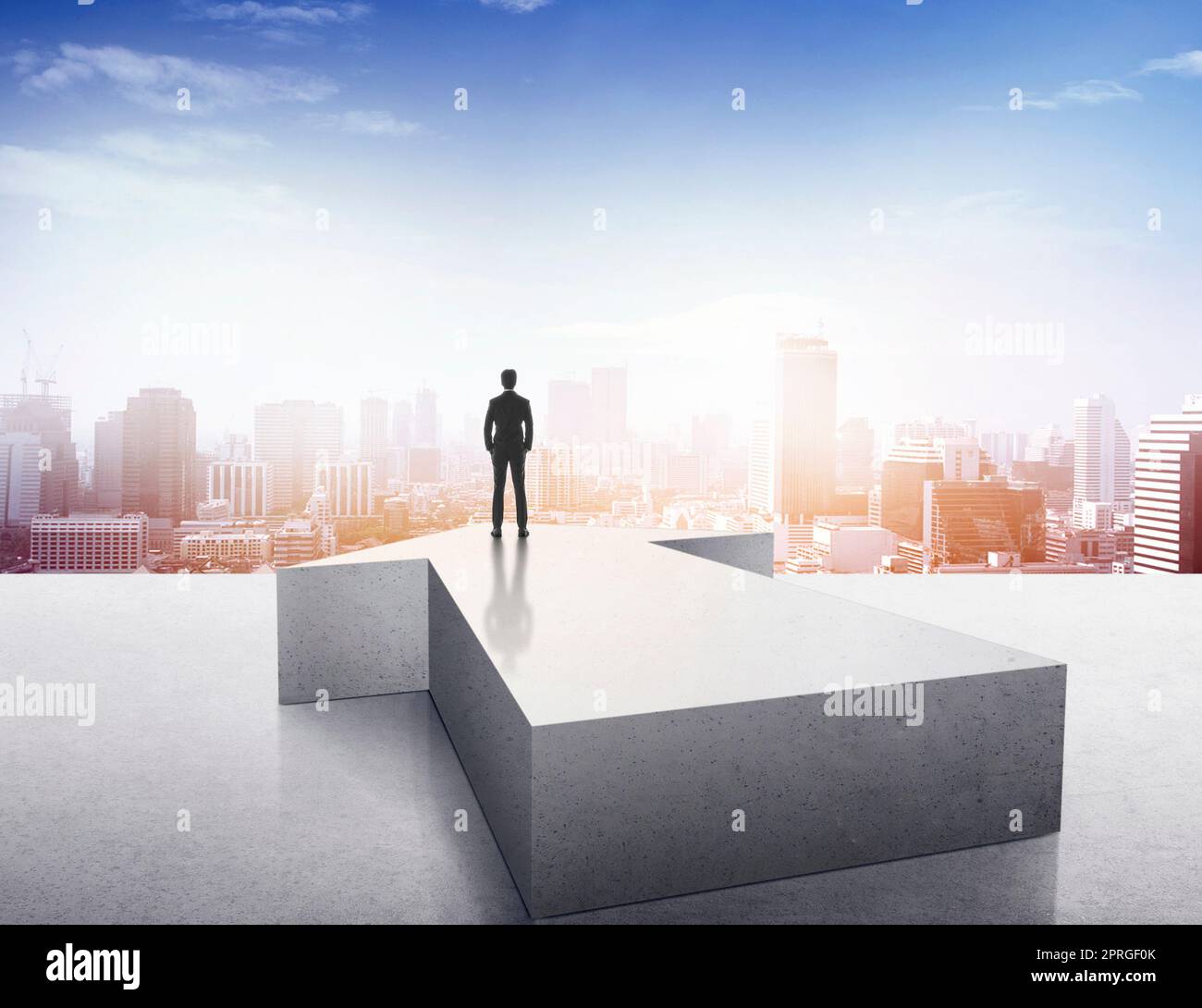 Vision concept. Successful businessman standing on arrow and looking ...