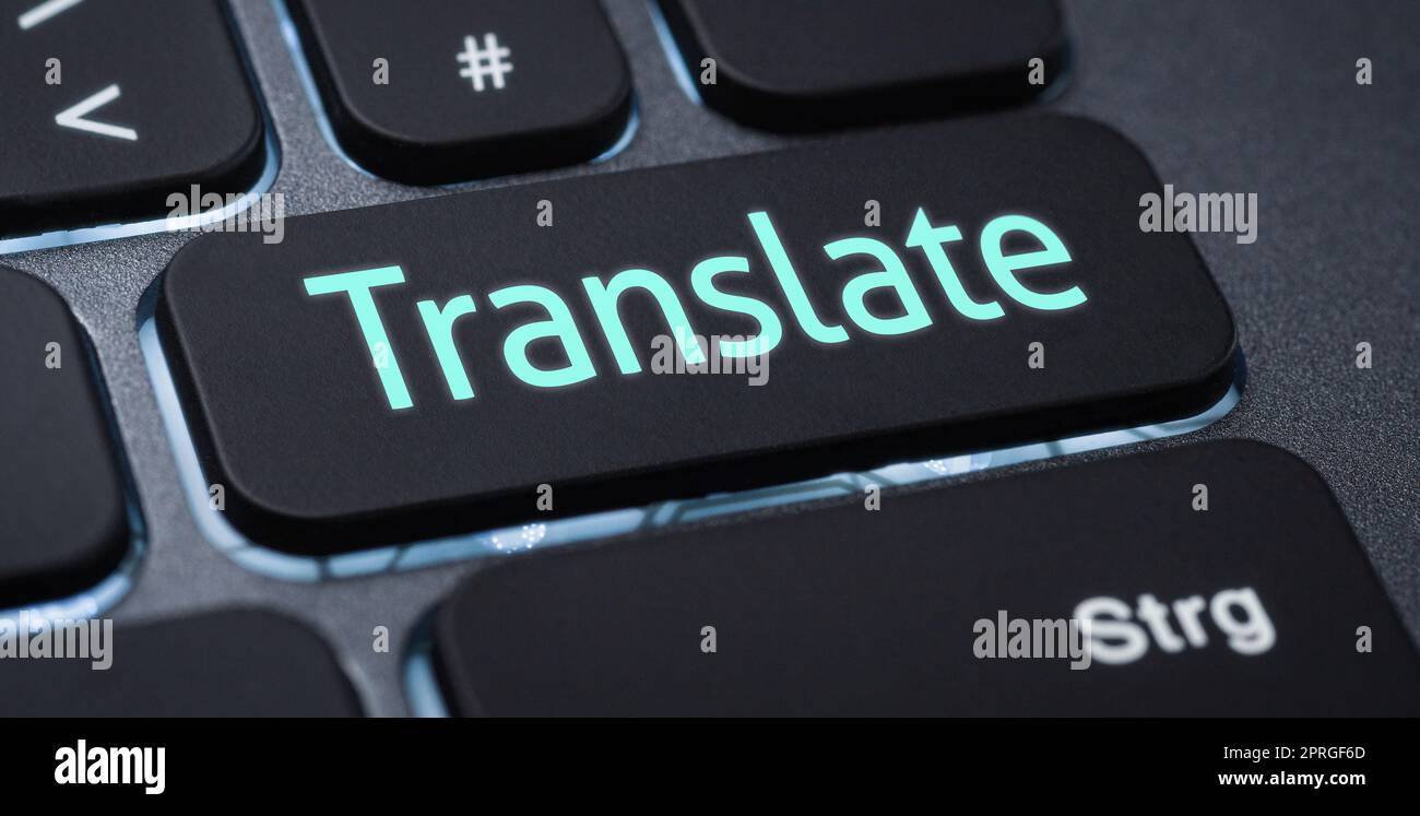 Illuminated keyboard with a labeled key - Translate Stock Photo - Alamy
