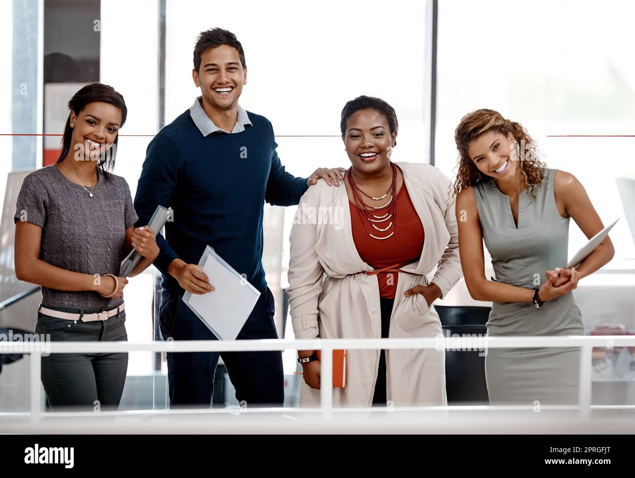 Were accomplishing our goals together. a young diverse group of ...