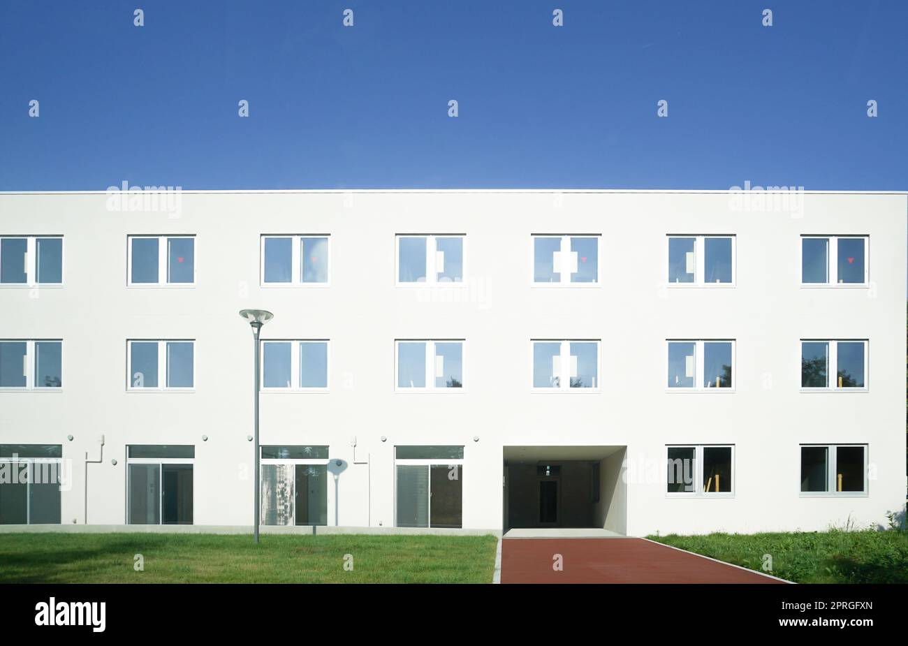 White building with blue hi-res stock photography and images - Alamy
