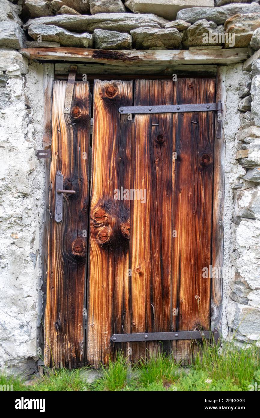 rustic wooden door on an alpine hut Stock Photo - Alamy