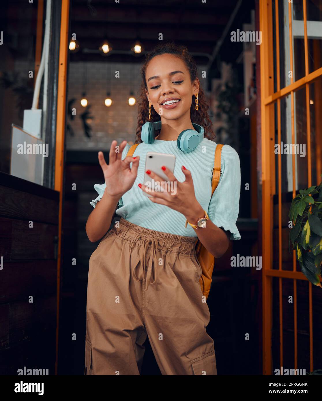 Happy gen z young woman with smartphone, social media fashion ...
