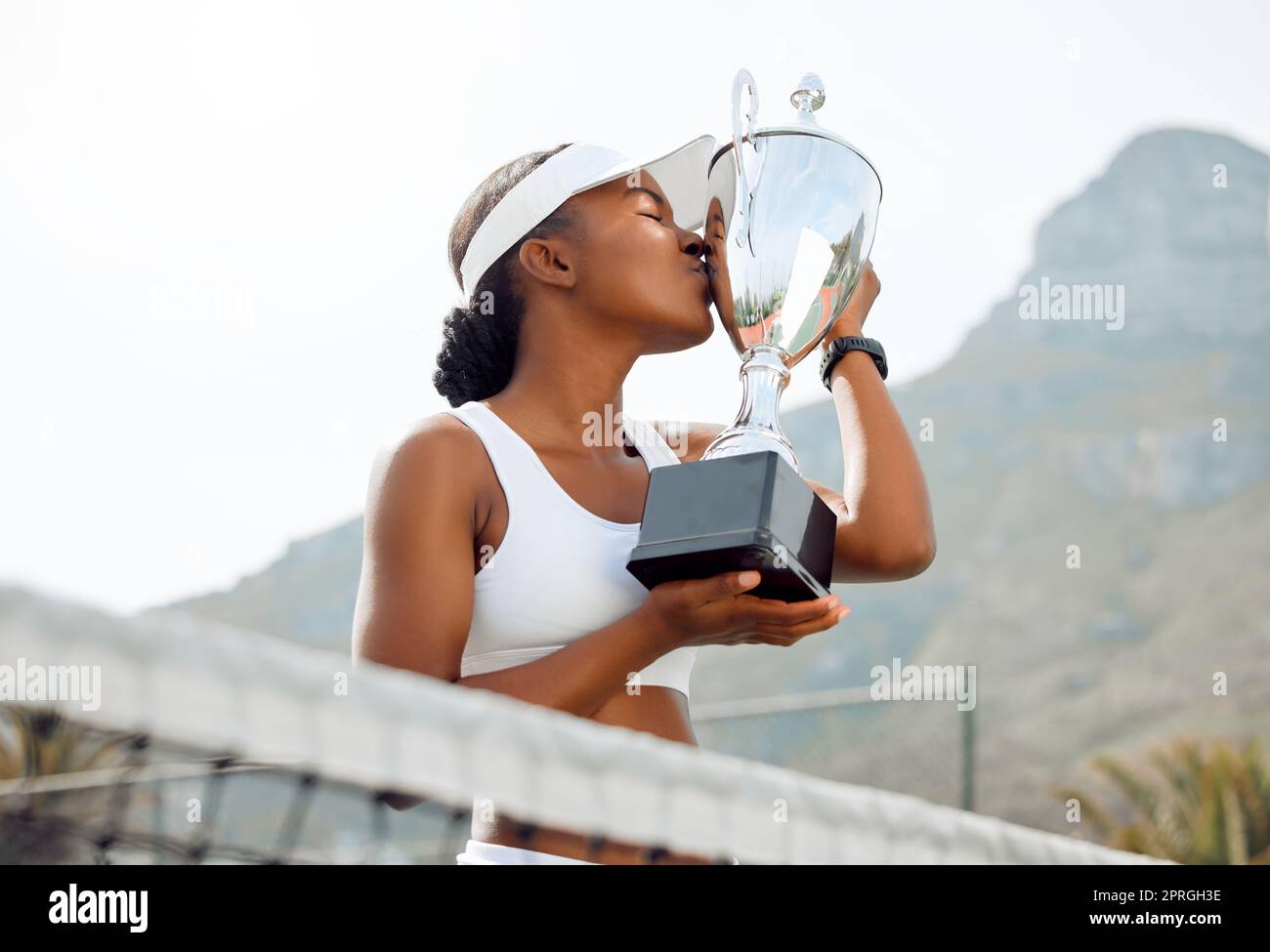 Female tennis player kissing trophy hi-res stock photography and images ...