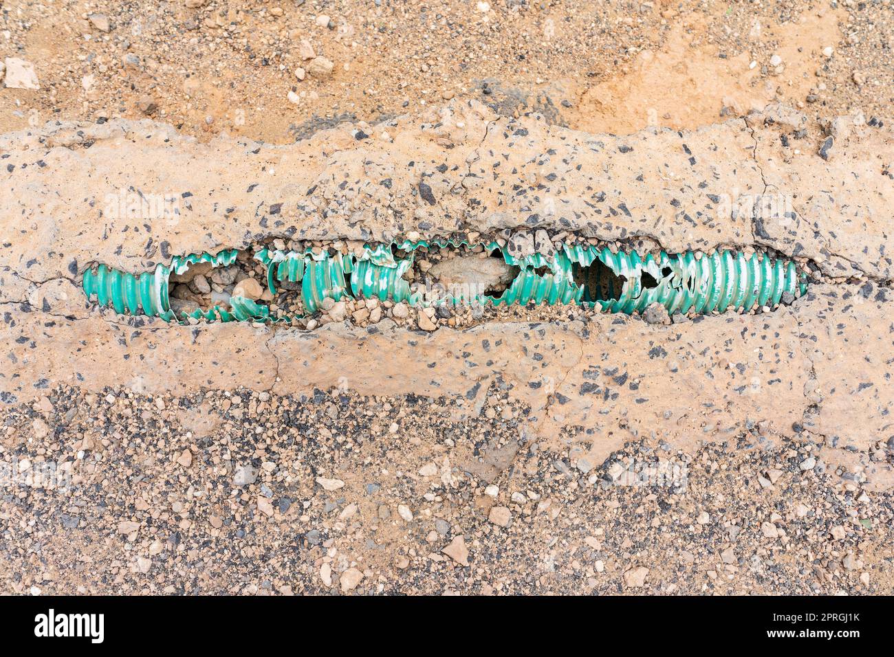 Cemented and damaged electrical cable channel Stock Photo - Alamy