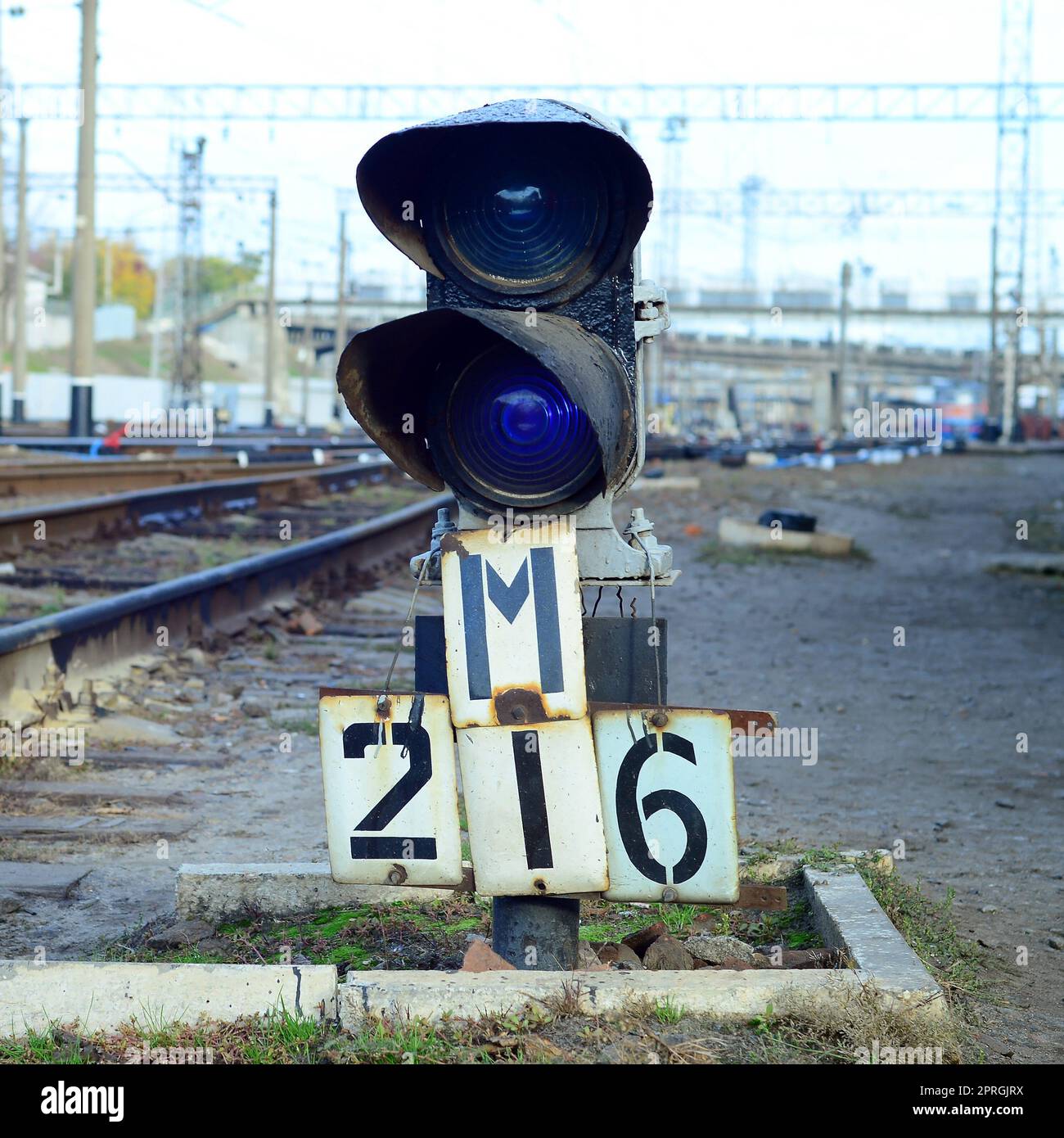 Railway semaphore traffic light against the background of a day railway ...