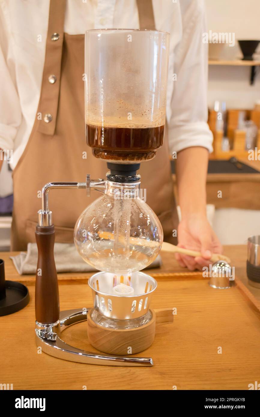 Syphon coffee maker in craft cafe, stock photo Stock Photo - Alamy