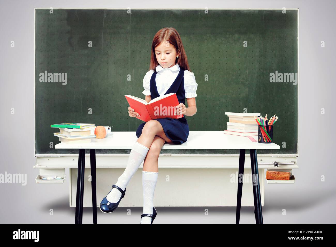 Sitting learning reading education classroom hi-res stock photography ...