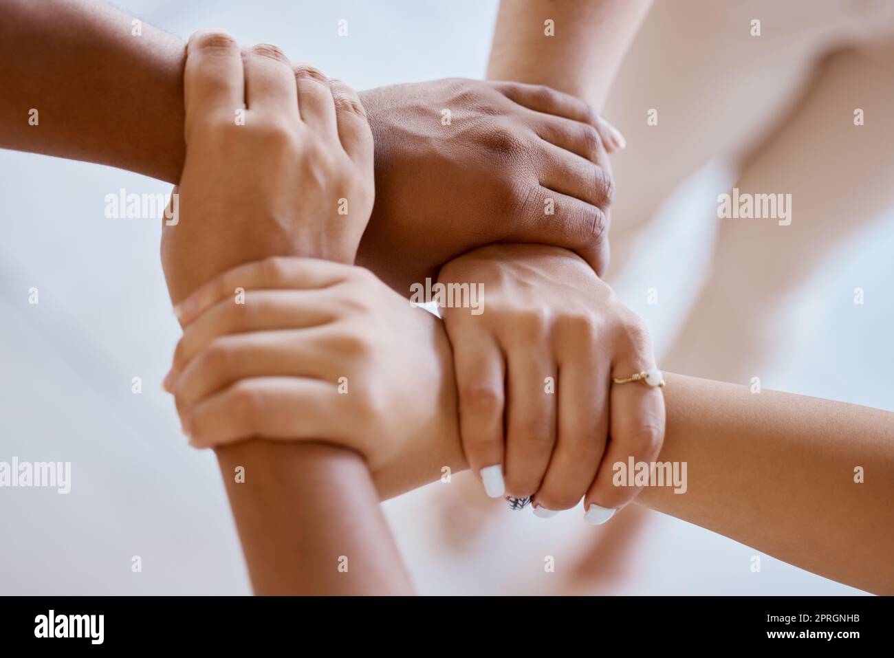 Hands, together and solidarity with a group of people strong in unity ...