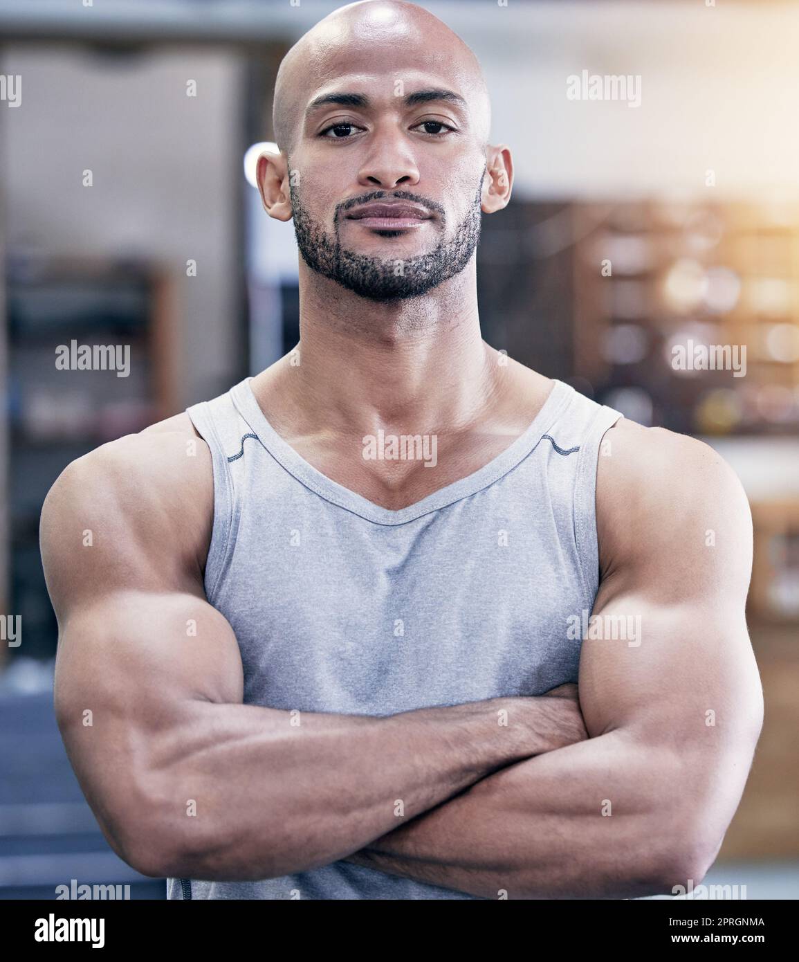 I choose strength over mediocrity. Portrait of a muscular young man ...