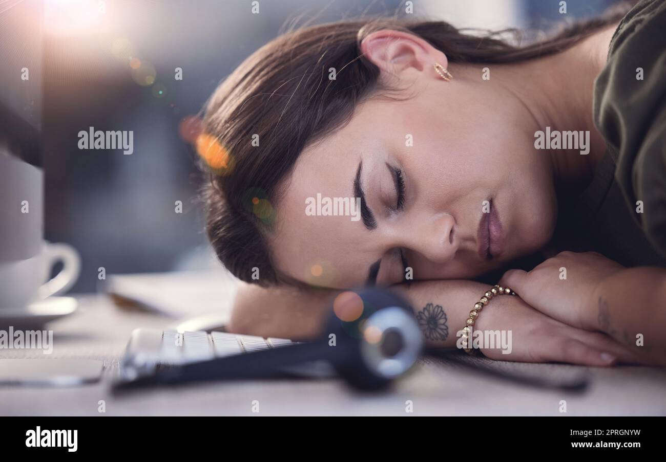 Just need to get my energy up. a young female call center agent taking ...