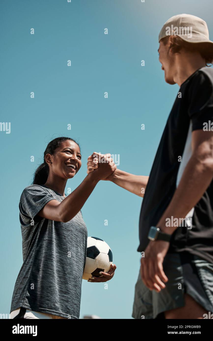 Handshake, soccer and team motivation, game goal and competition ...