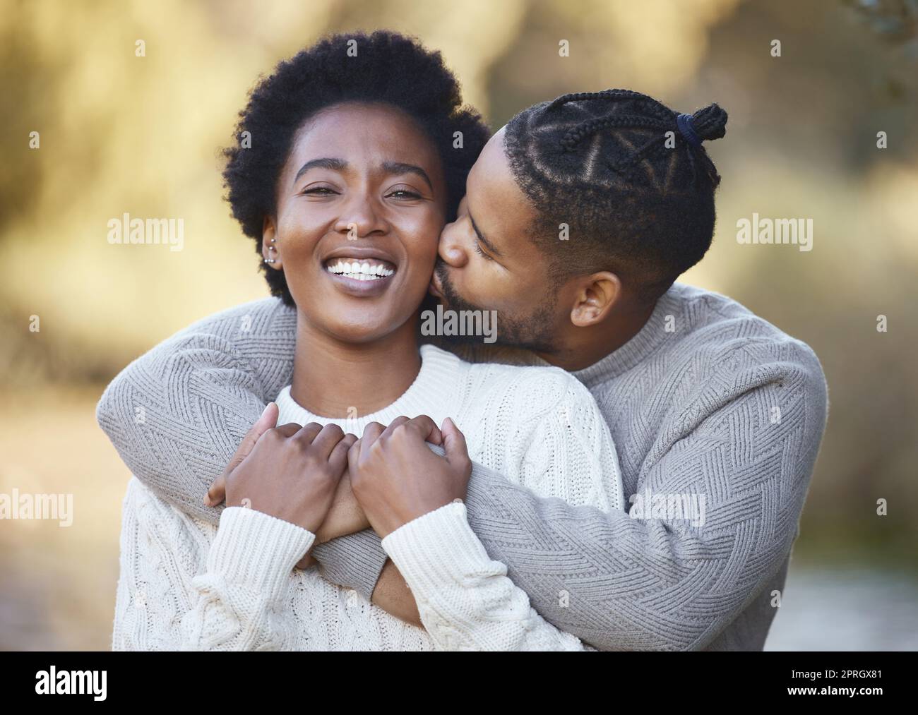 Man kissing his wife on the cheek hi-res stock photography and images ...