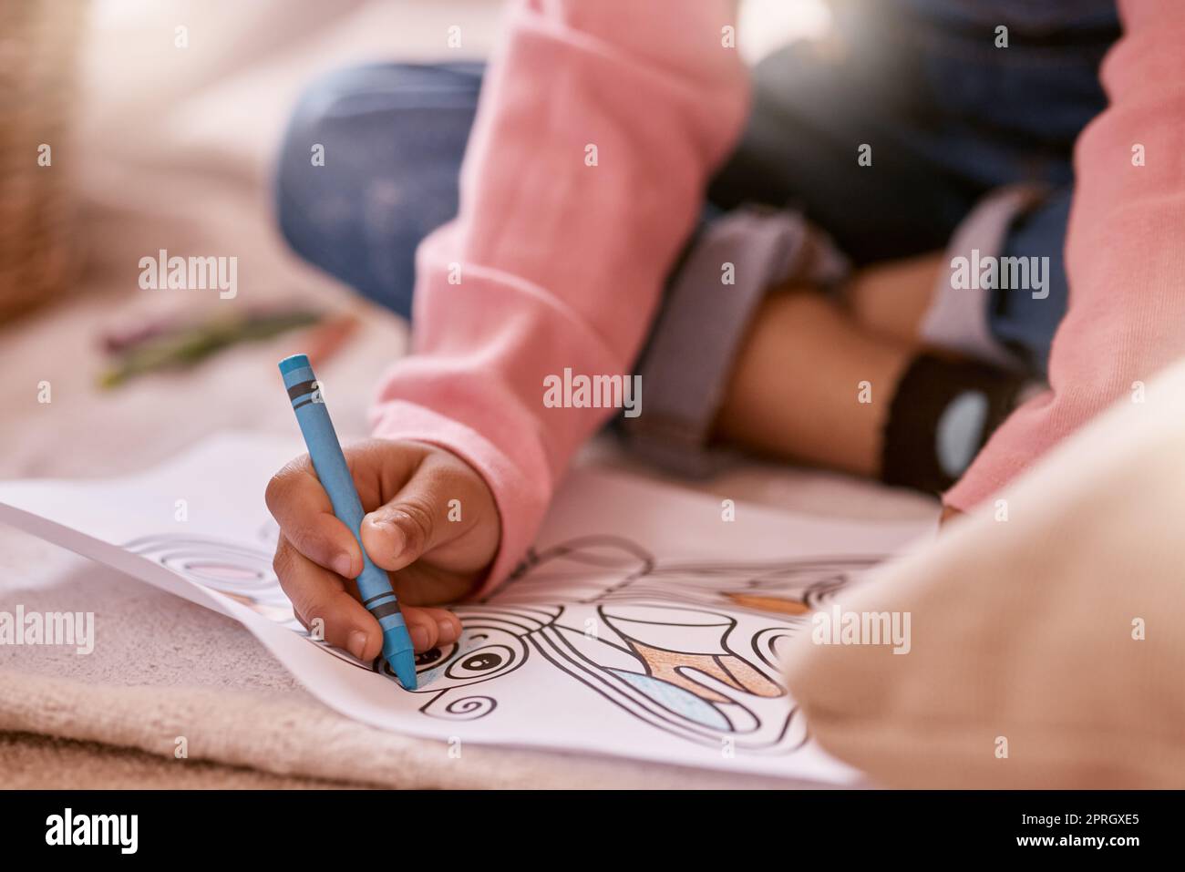 She can draw all day. an unrecognizable girl drawing on a piece of ...
