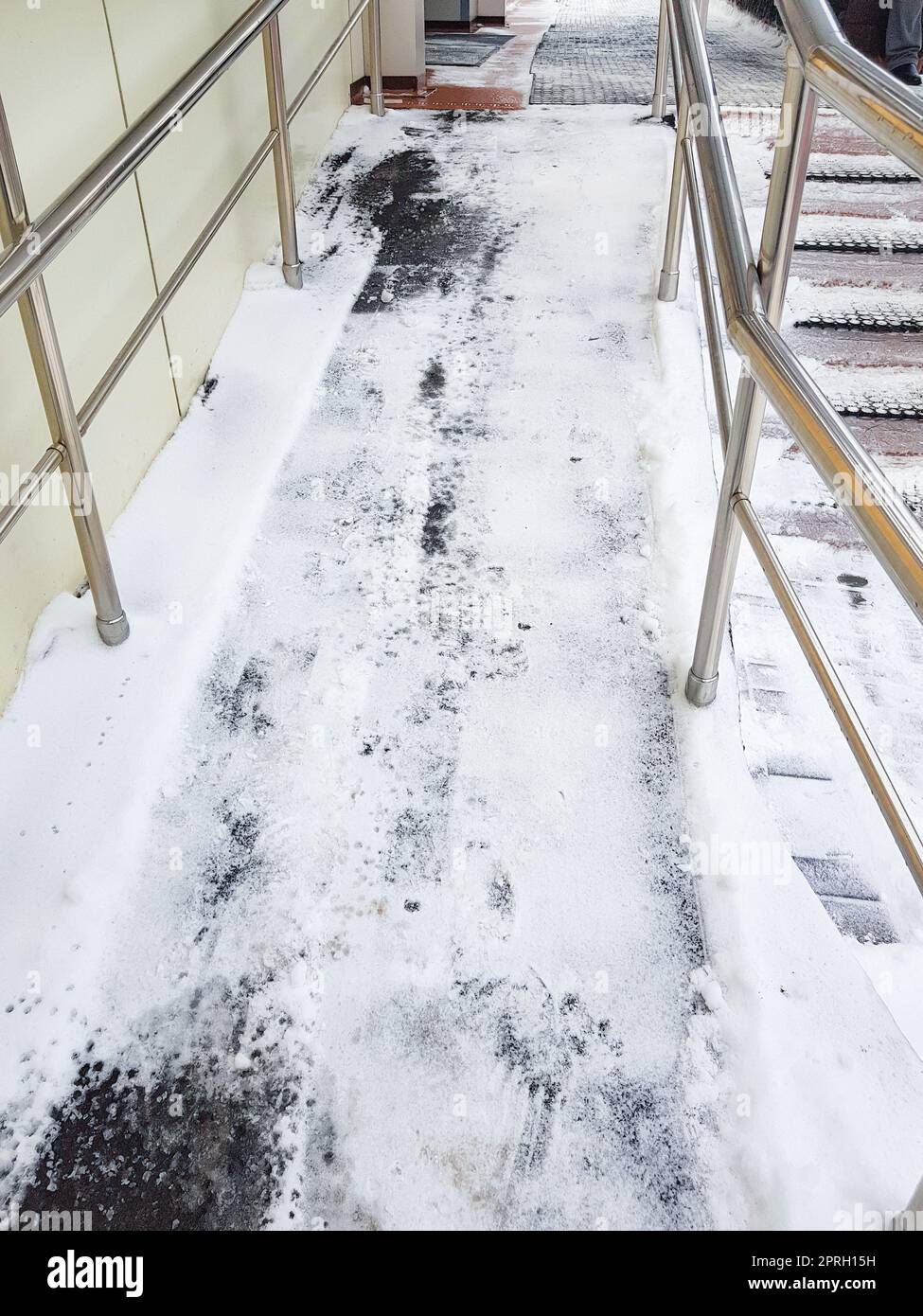 Modern ramp with metal railings for accessible movement of people with ...