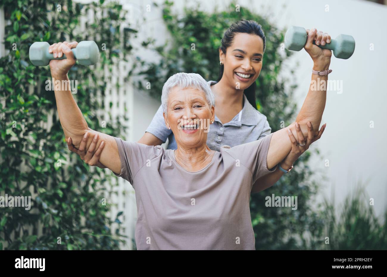 Older people lifting weights hi-res stock photography and images - Alamy