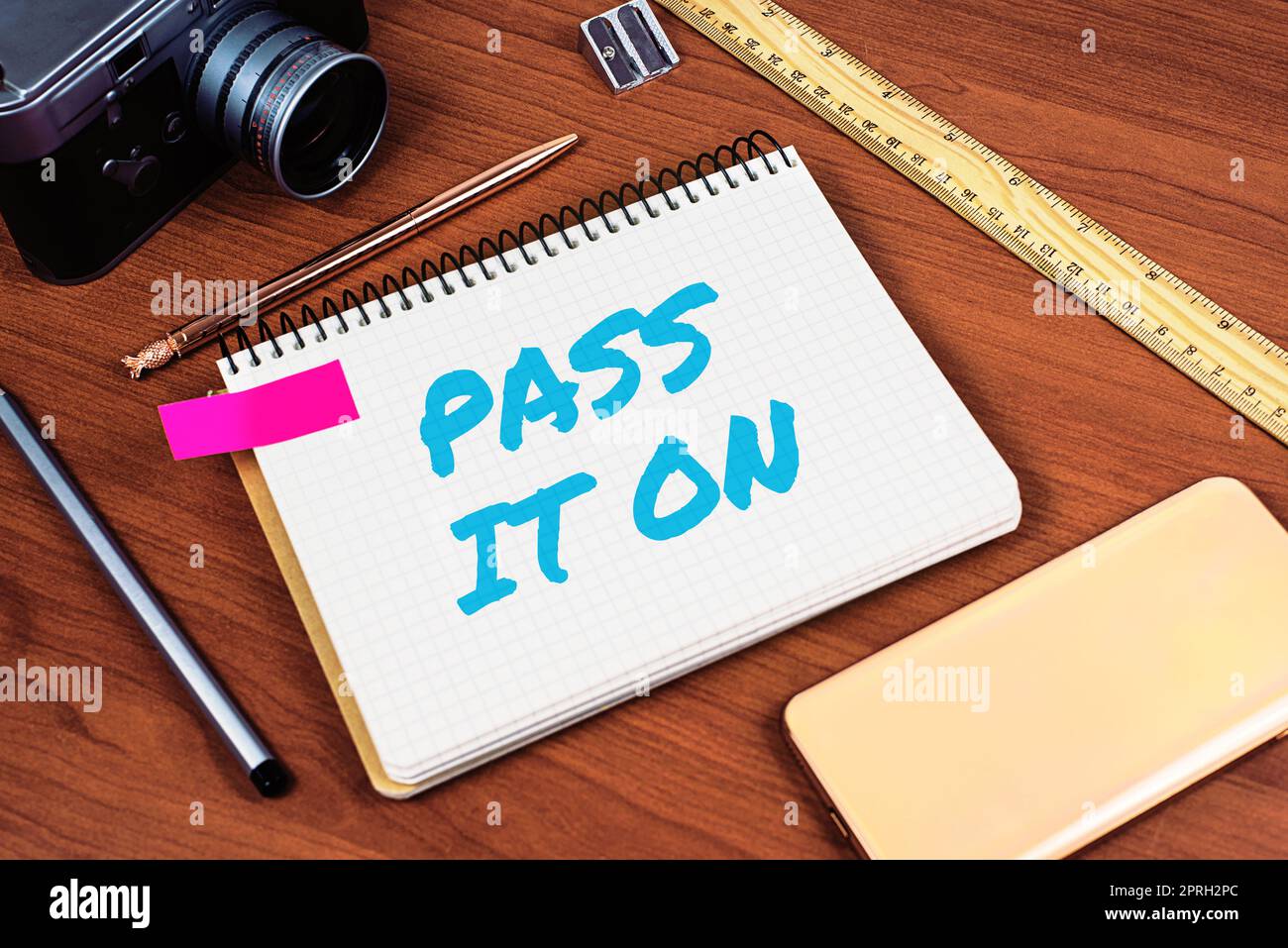 Sign displaying Pass It On. Concept meaning Share something with others ...