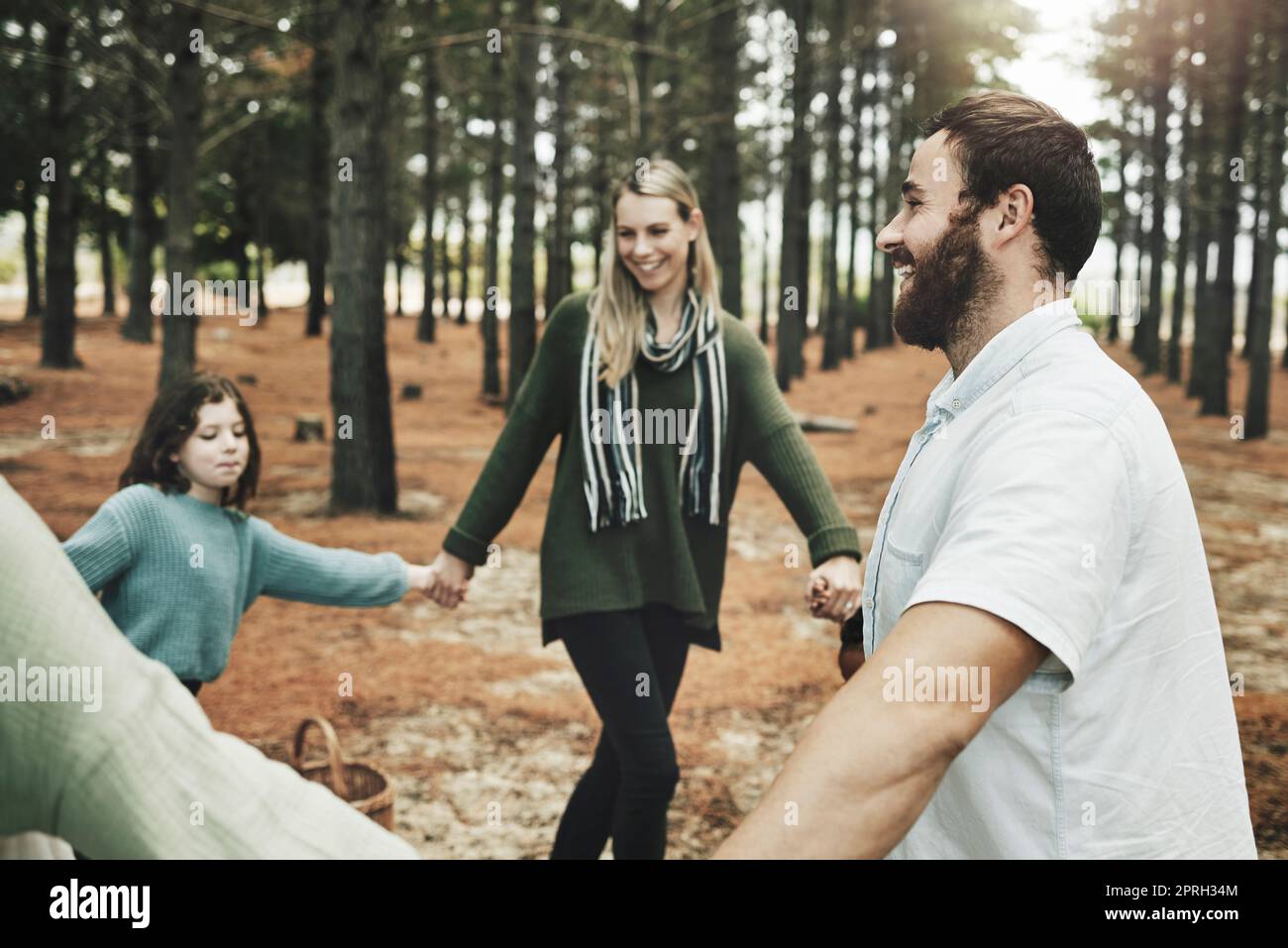 Family circle, forest and nature game with children, parents or ...