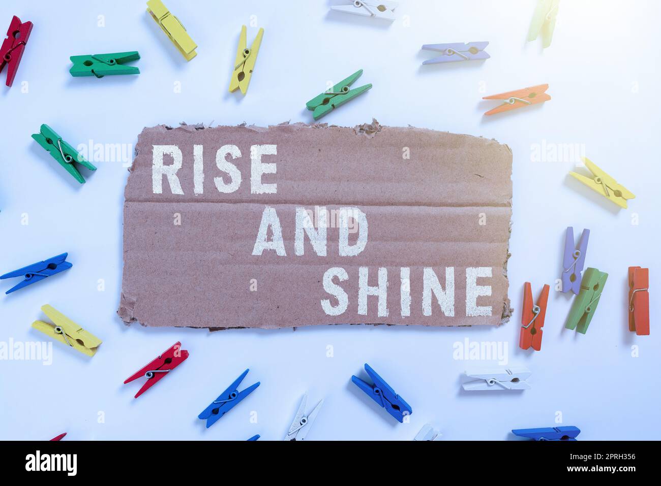 Hand writing sign Rise And Shine. Concept meaning Motivation for ...