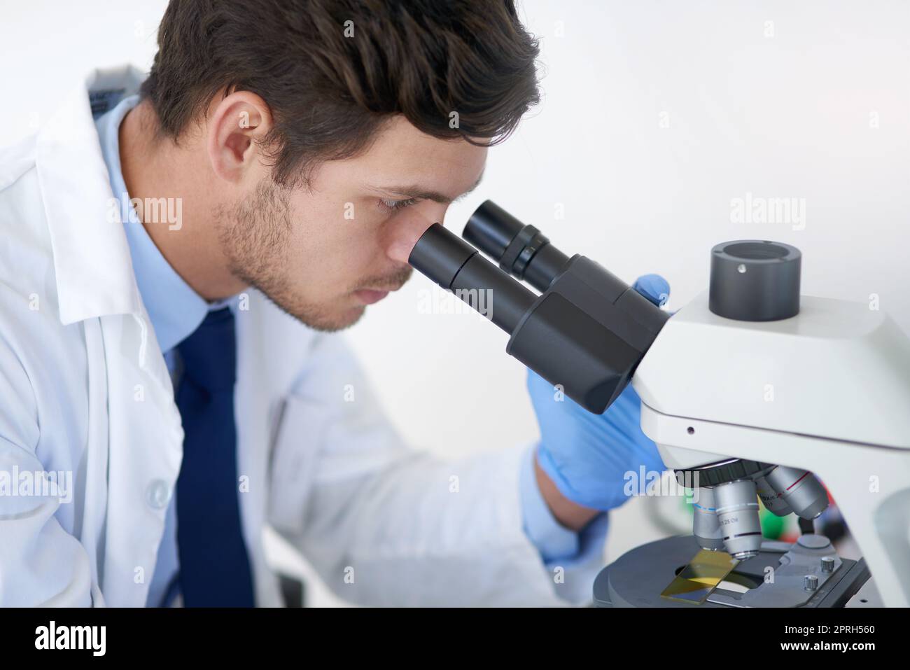 Identifying microorganisms that are causing infection. a young male ...