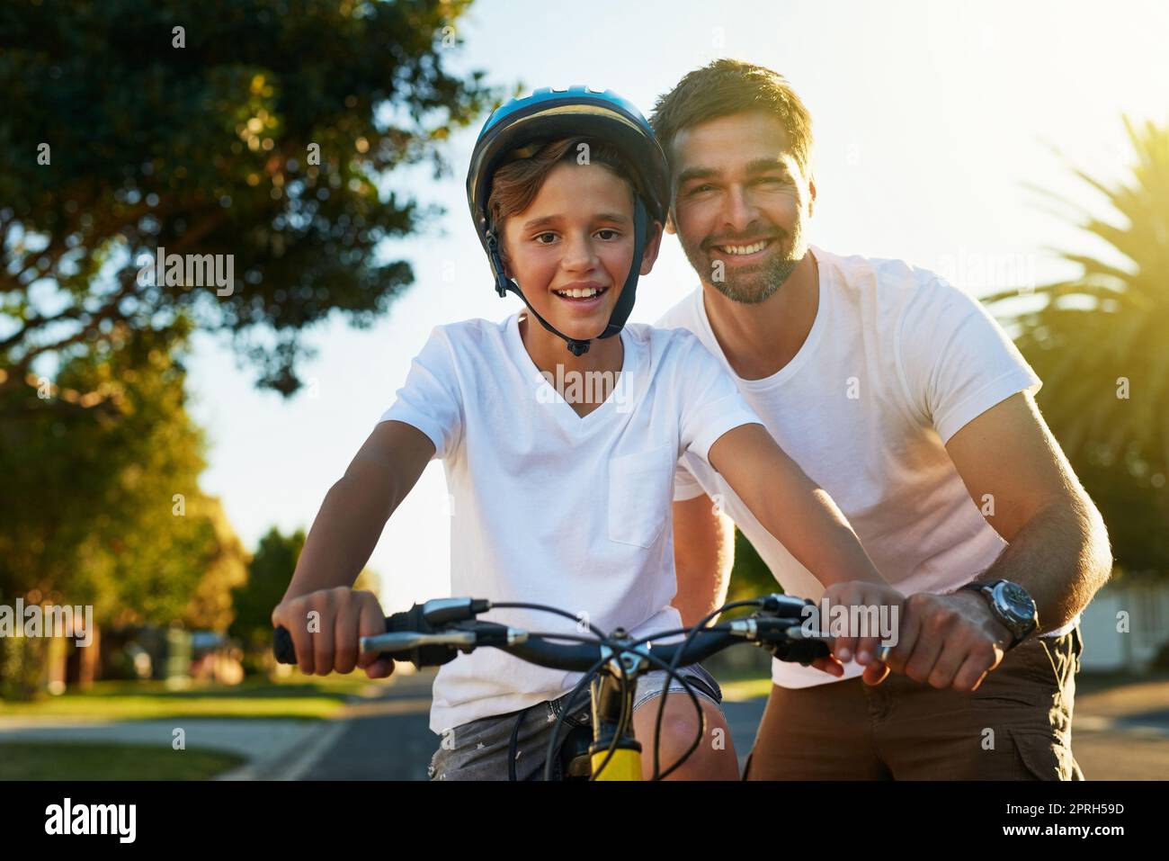 Boy riding his bicycle hi-res stock photography and images - Alamy