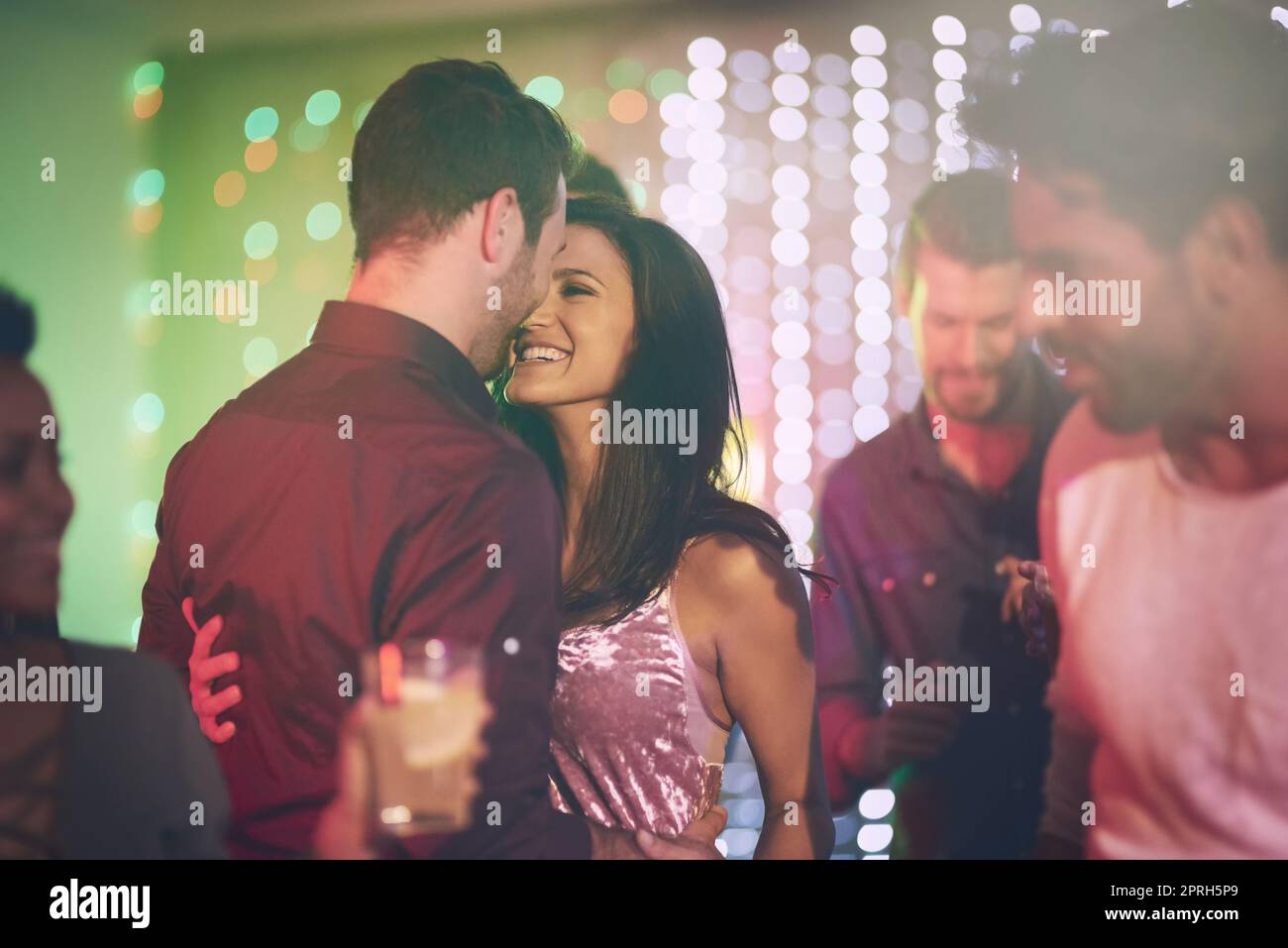 Young couple dancing at night club hi-res stock photography and images ...