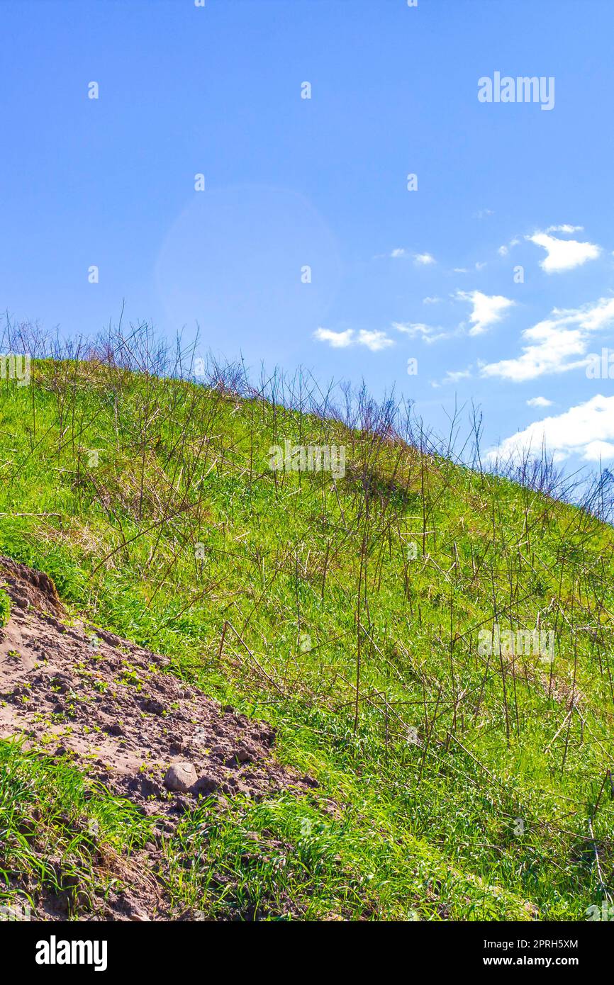 Excavated sand mountains and rubble piles quarry lake dredging pond ...