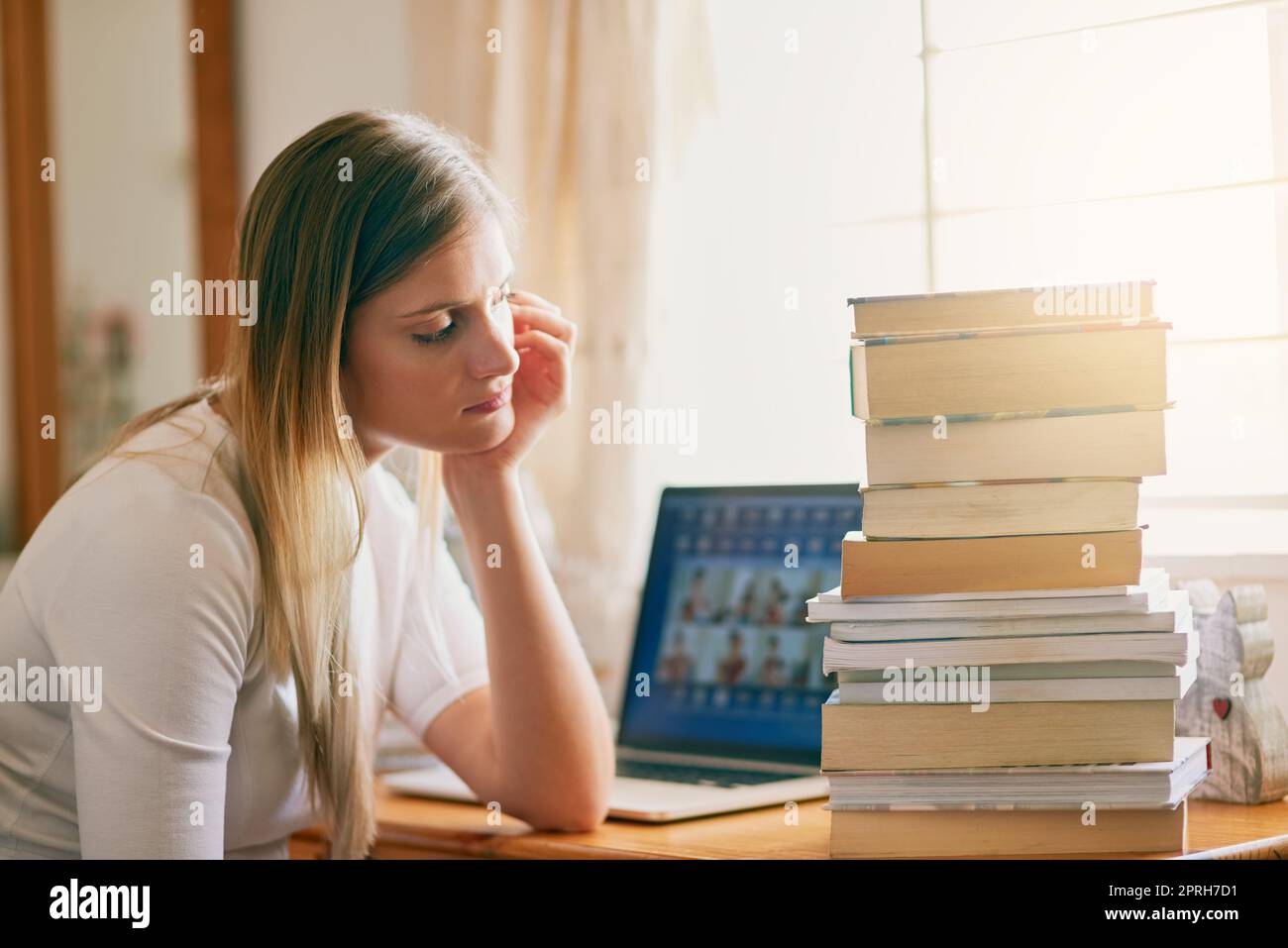 Overwhelmed Student With Books