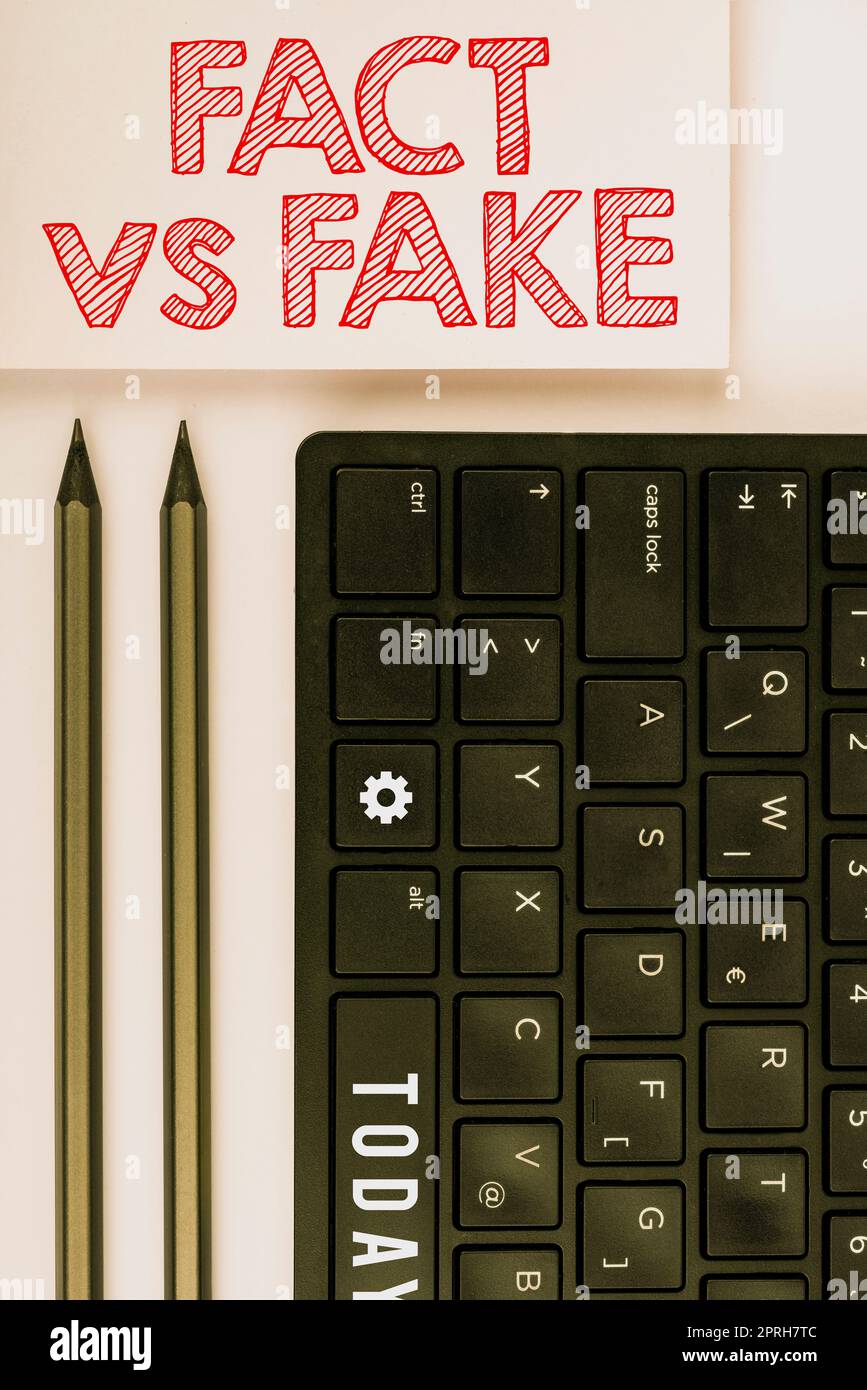 Hand writing sign Fact Vs Fake, Word Written on Rivalry or products or ...