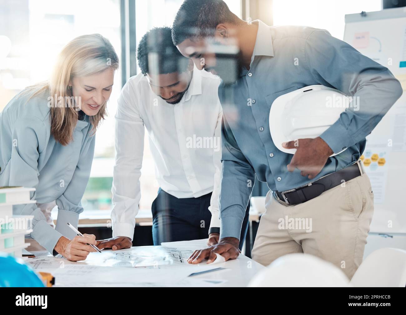 Collaboration, meeting and design with architect in office with blueprint, planning and project ...