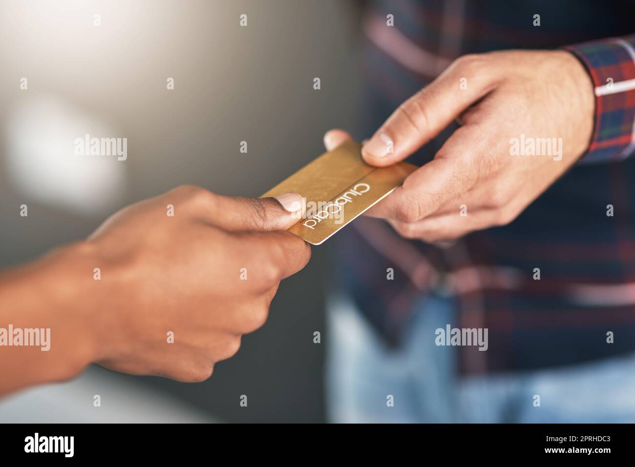 Adult handing over hi-res stock photography and images - Alamy