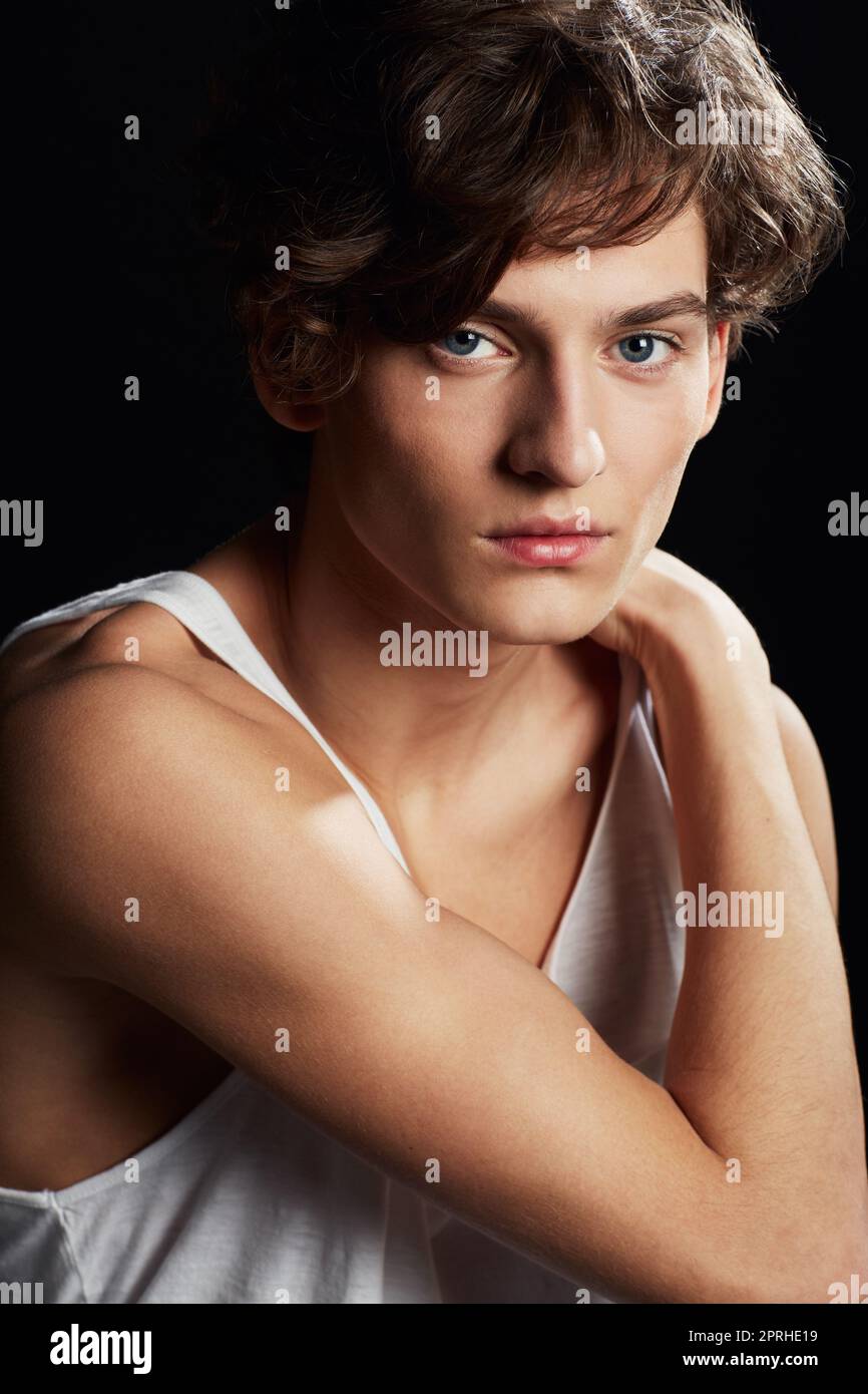 Emotive eyes set in a youthful face. Portrait of a fresh-faced young ...