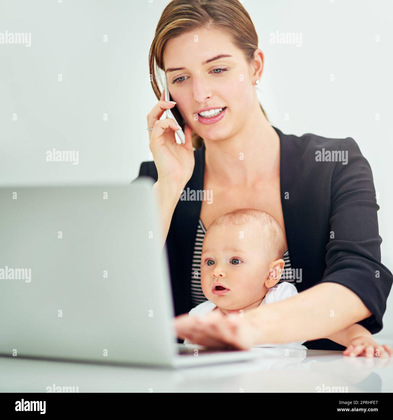 Mother looking after kids hi-res stock photography and images - Alamy