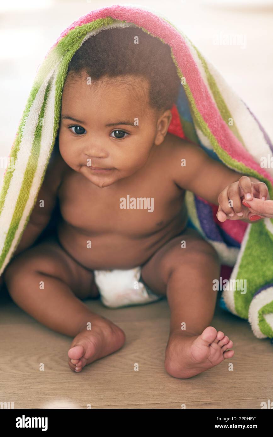 Somebody get me outta here. an adorable baby girl covered in a colorful ...