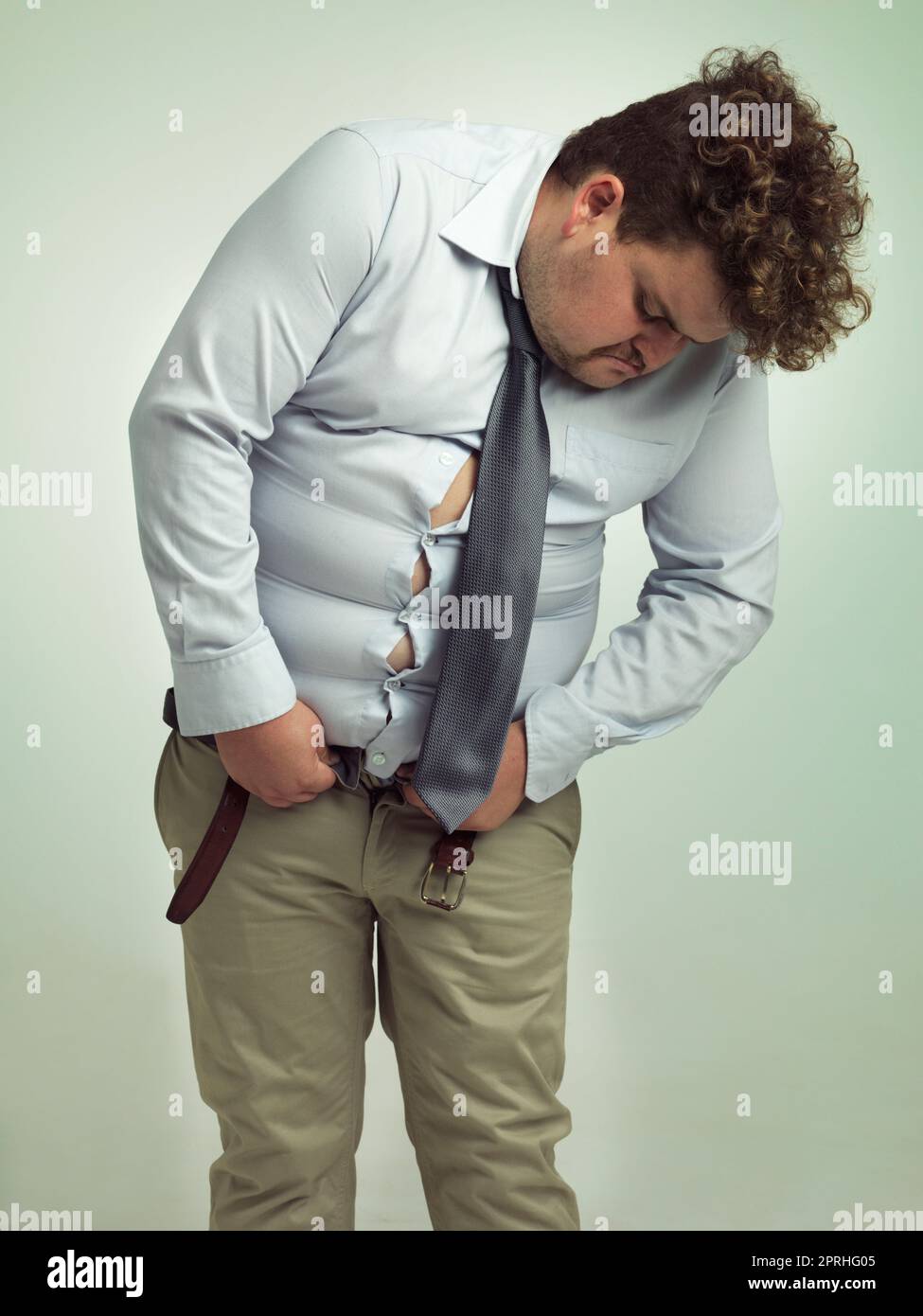 Man pants and stomach hi-res stock photography and images - Alamy