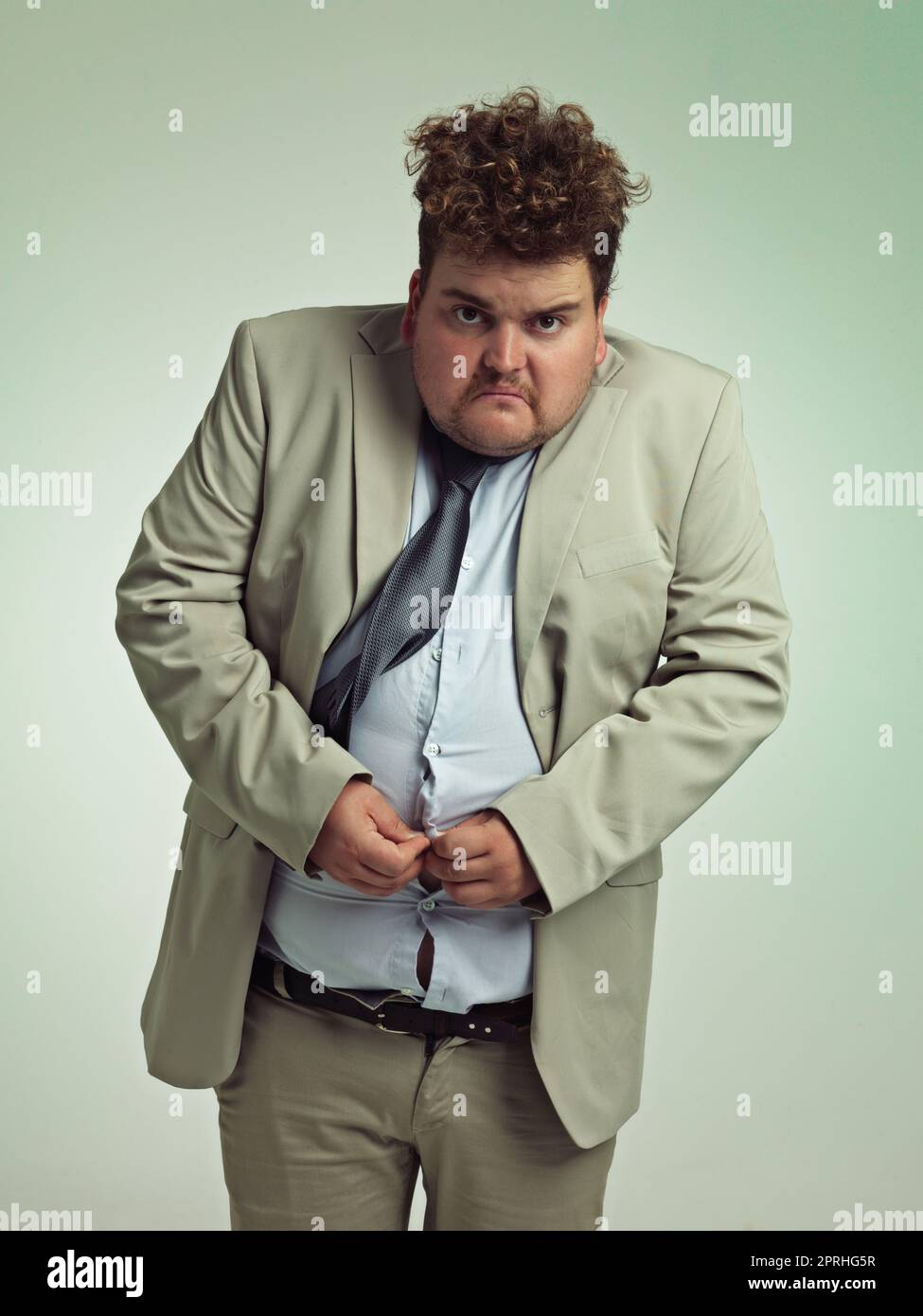 Fat man in suit hi-res stock photography and images - Alamy