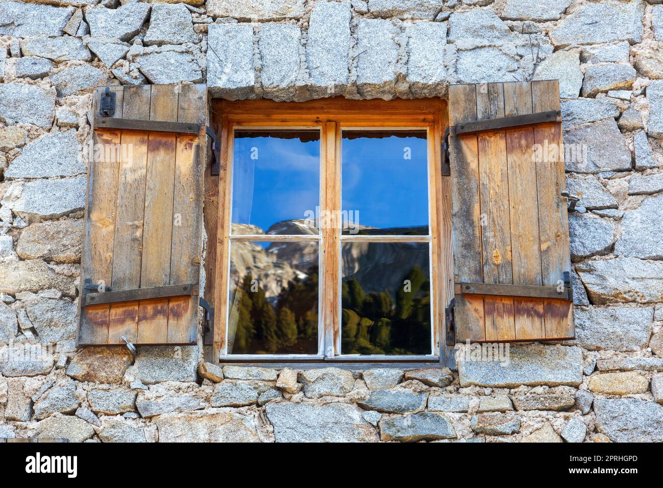 Window with reflections of the landscape Stock Photo - Alamy