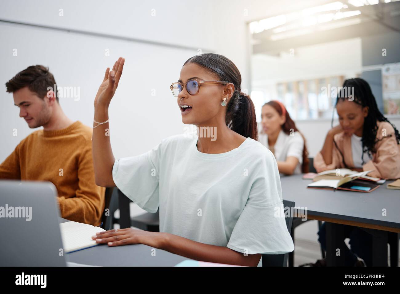 Diverse discuss students classroom hi-res stock photography and images ...
