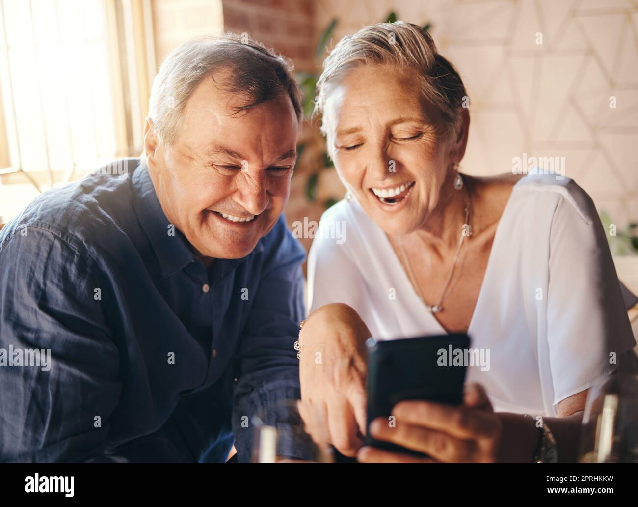 Old woman scrolling on phone hi-res stock photography and images - Alamy