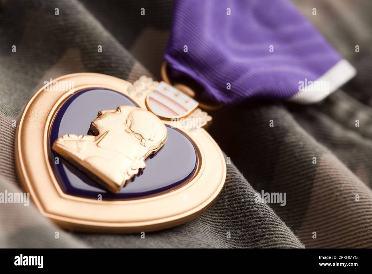 Purple heart medal camouflage material hi-res stock photography and ...