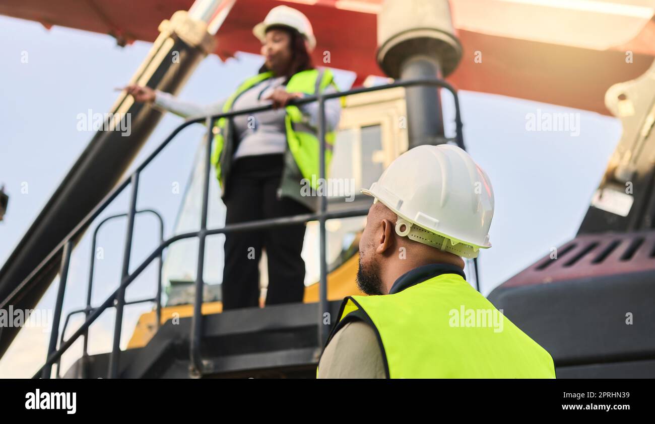 Logistics, black woman on crane and man in container shipping yard ...