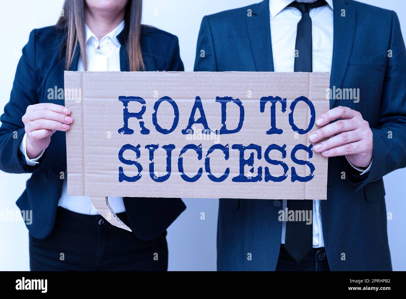 Sign displaying Road To Successstudying really hard Improve yourself to ...