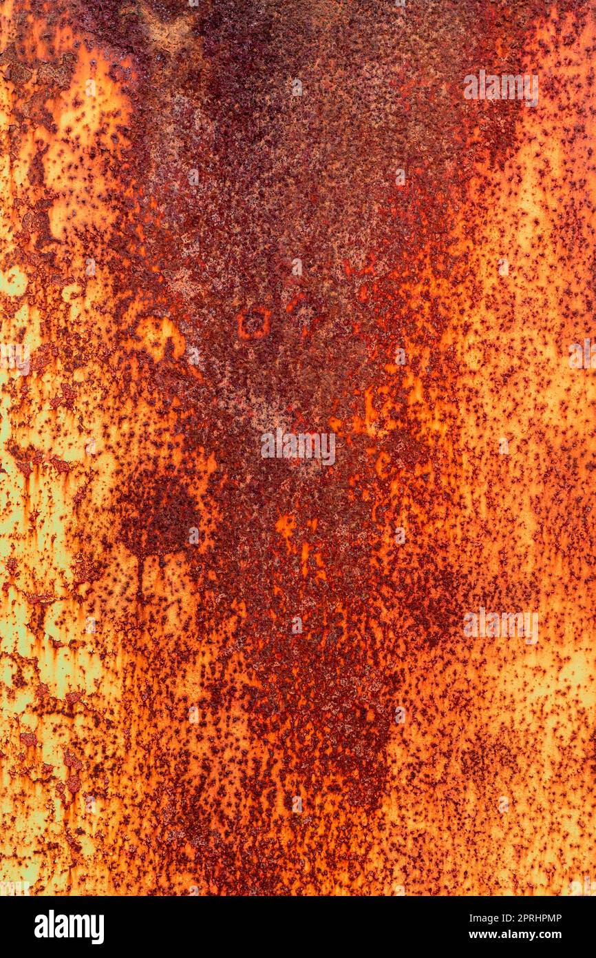 Rust texture on a yellow background. The yellow wall is dirty and rusty ...