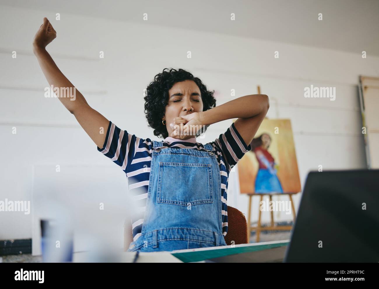 Studio, art and tired painter stretching after working on artwork ...