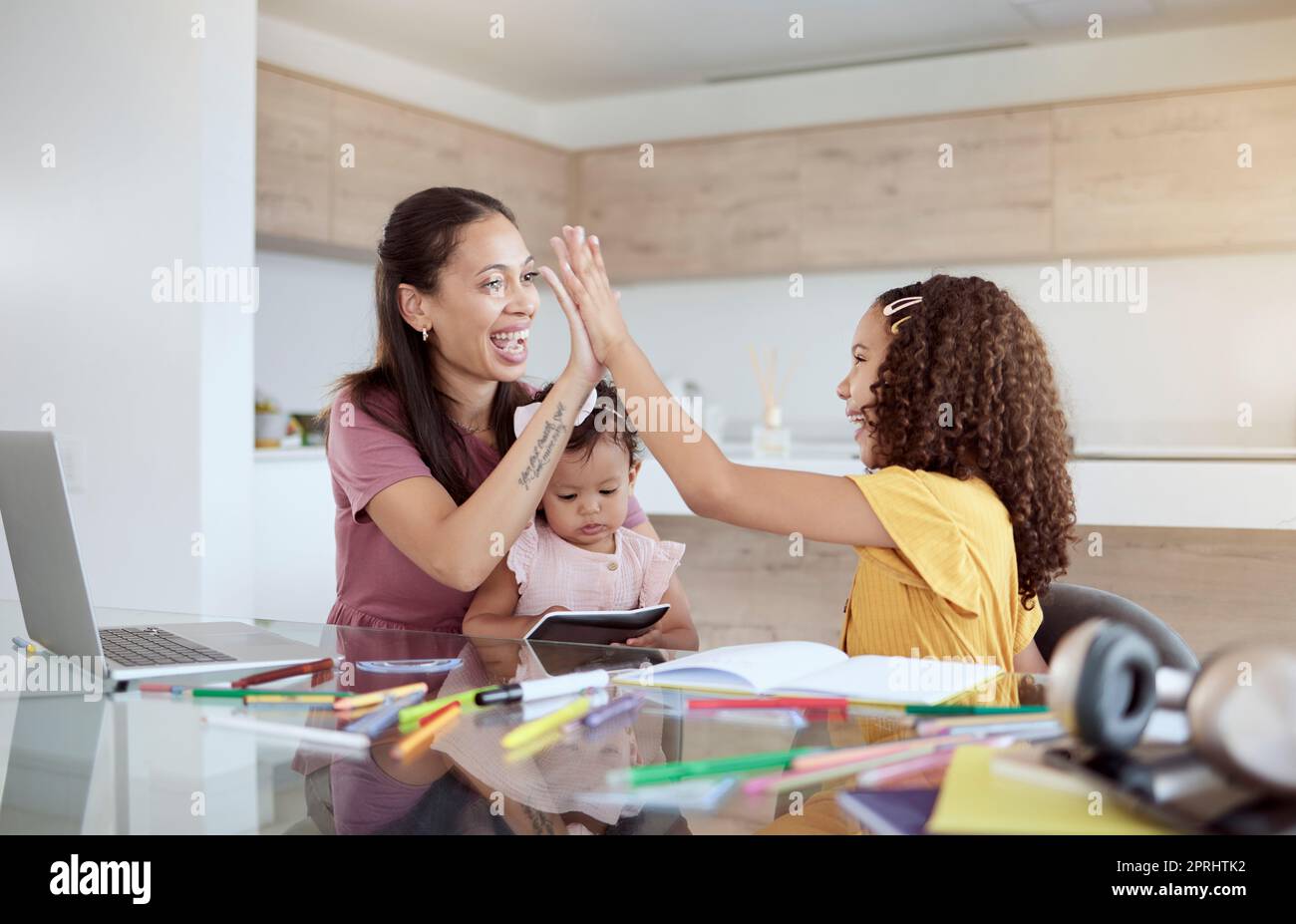 Learning, mother and child high five for home education success for a school students project ...