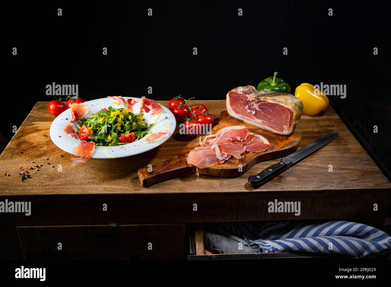 Rocket salad with dried Spanish ham Stock Photo - Alamy