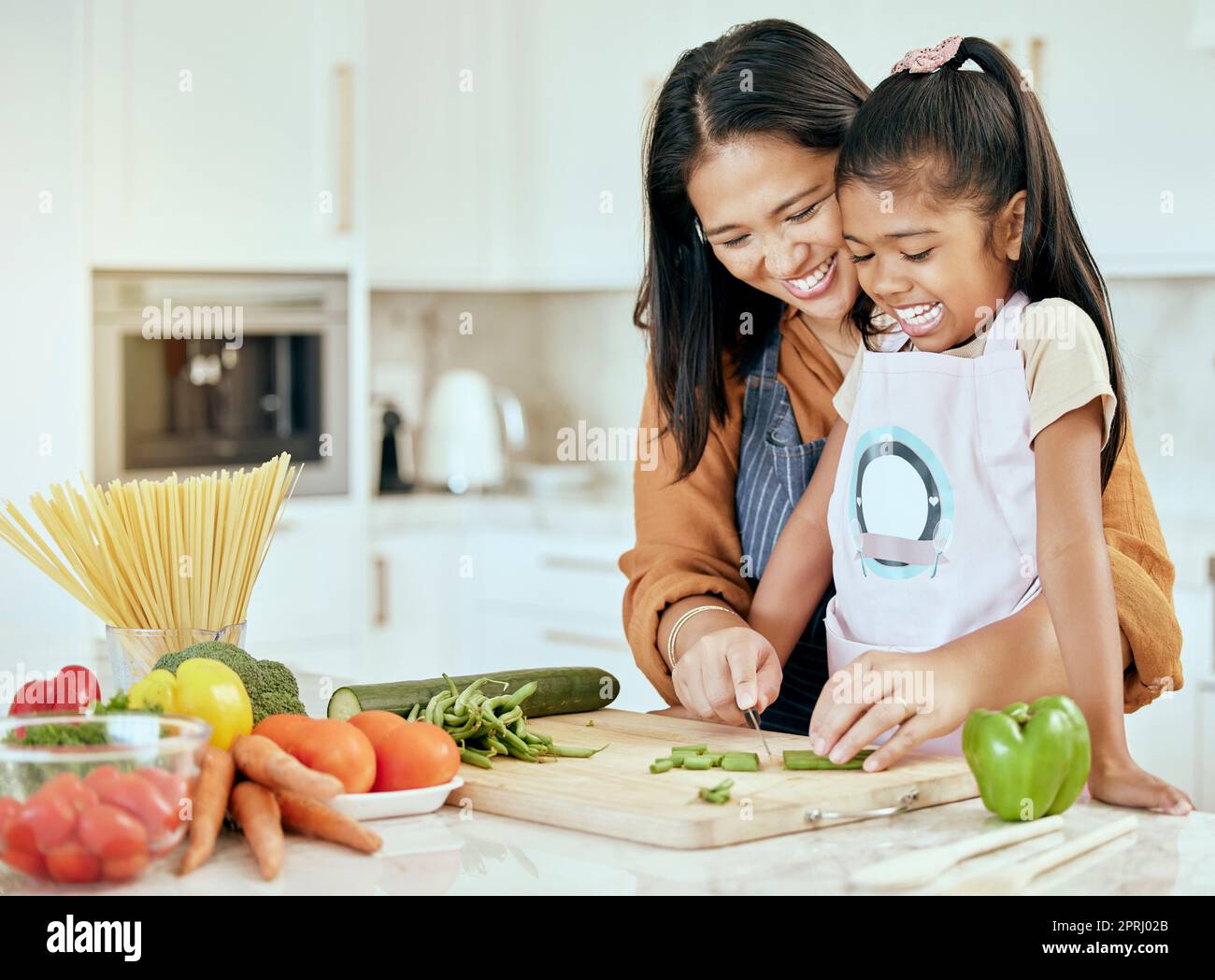 Cooking, health and mother and girl in kitchen for food, learning and ...