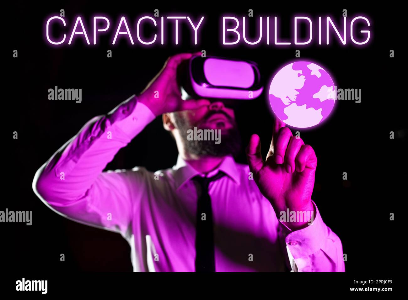 Text sign showing Capacity BuildingStrengthen the abilities of ...