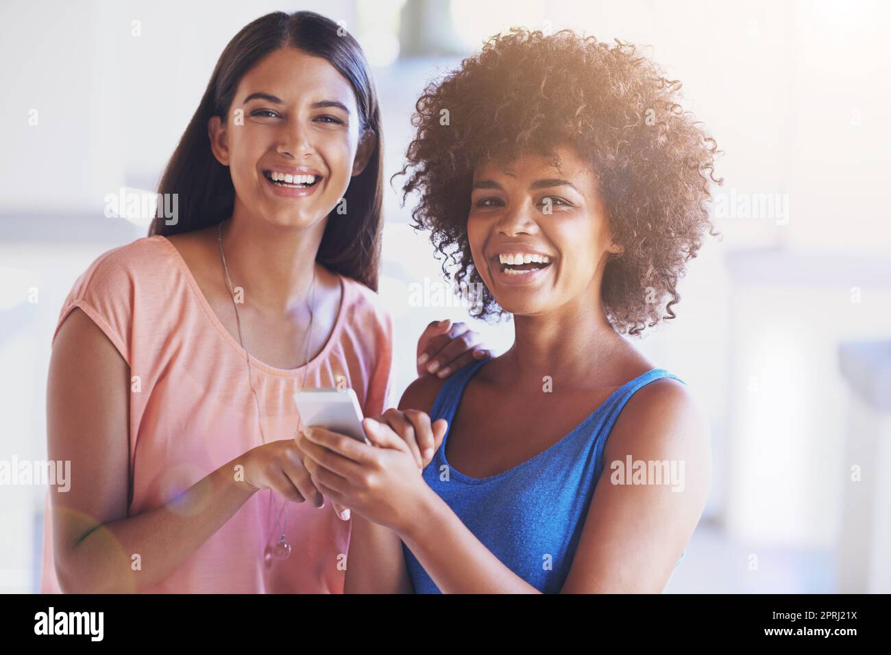 Weve Got That Bestie Connection Two Girlfriends Hanging Out Together Using A Cellphone Stock